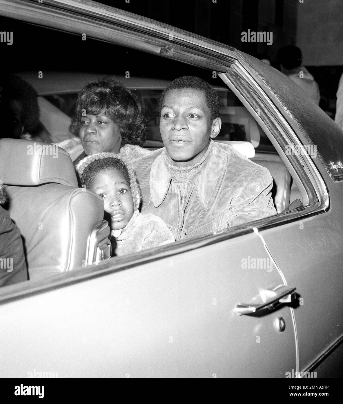 Walter Thomas leaves in a car with his family, after being released ...