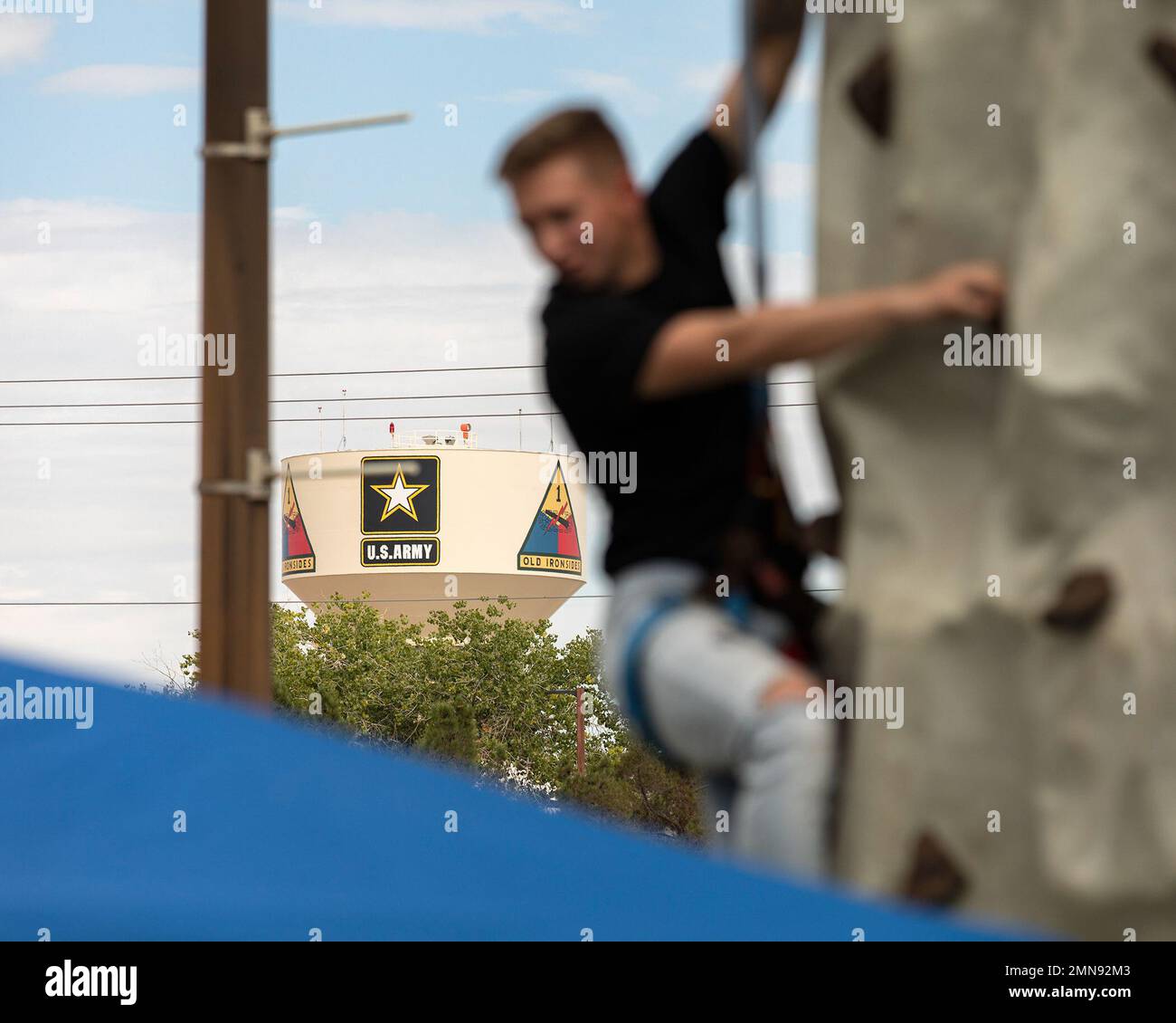 A Soldier takes to the rock wall at the 2022 B.O.S.S. Bash at Fort ...