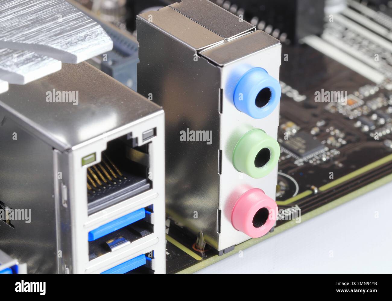 Multiple ports on modern computer mainboard show with USB 3.1, LAN ...