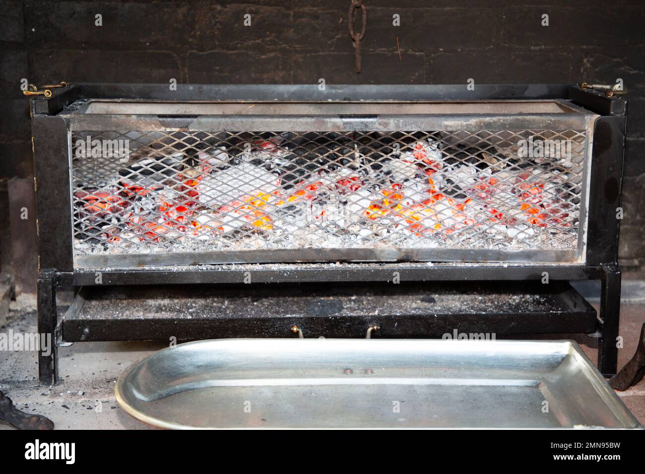 Burning grill briquettes with empty grid Stock Photo - Alamy Burning grill briquettes with empty grid Stock Photo - Alamy
