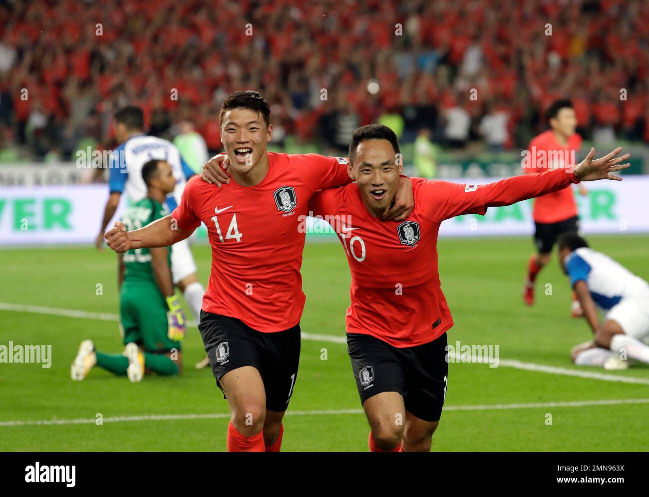 South Korea's Moon Seon-min, right, celebrates with his teammate Hwang ...