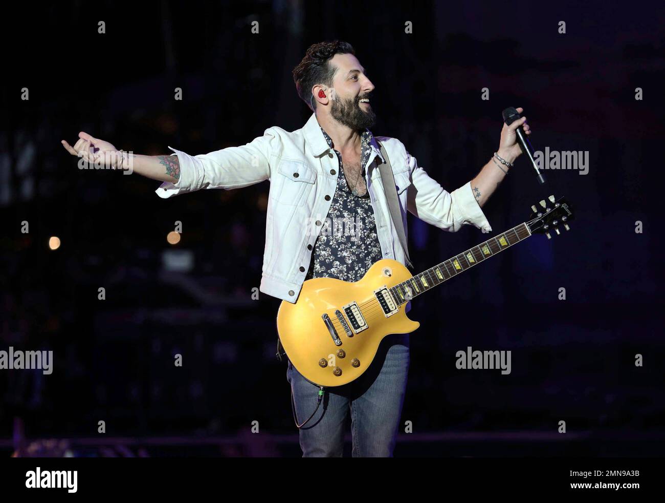 Matthew Ramsey with Old Dominion performs during the Trip Around The ...