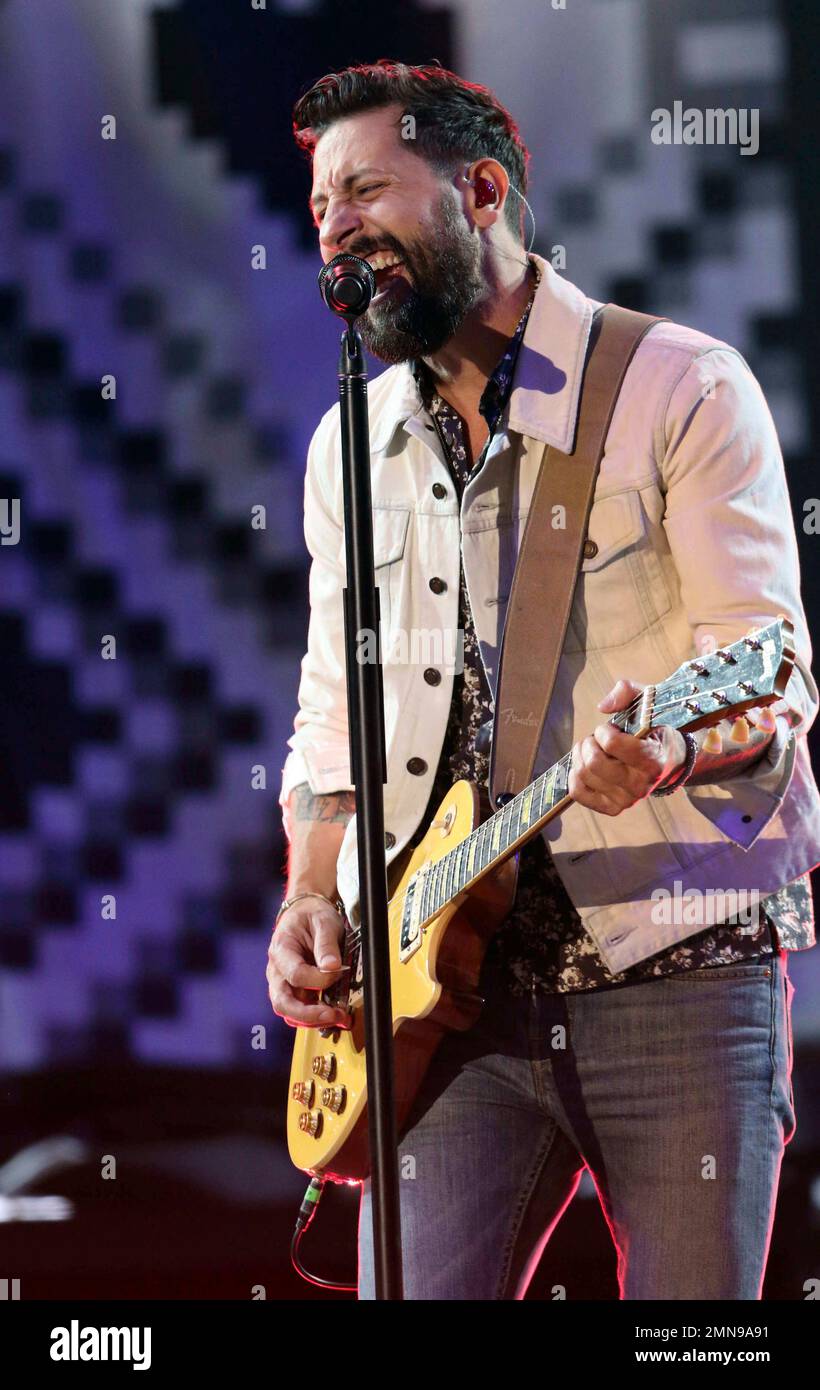 Matthew Ramsey with Old Dominion performs during the Trip Around The ...