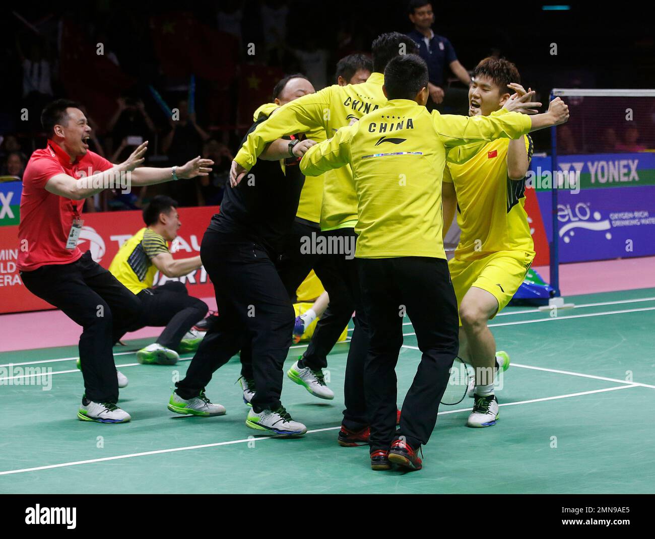 China team members react after winning their Thomas Cup finals ...