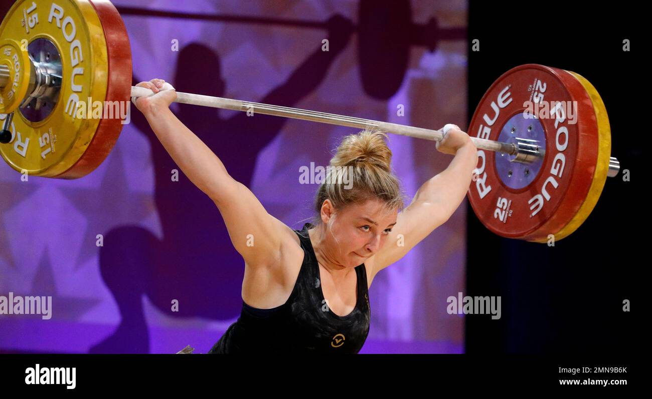 Combined winner Kate Vibert lifts in the snatch portion of the women's ...