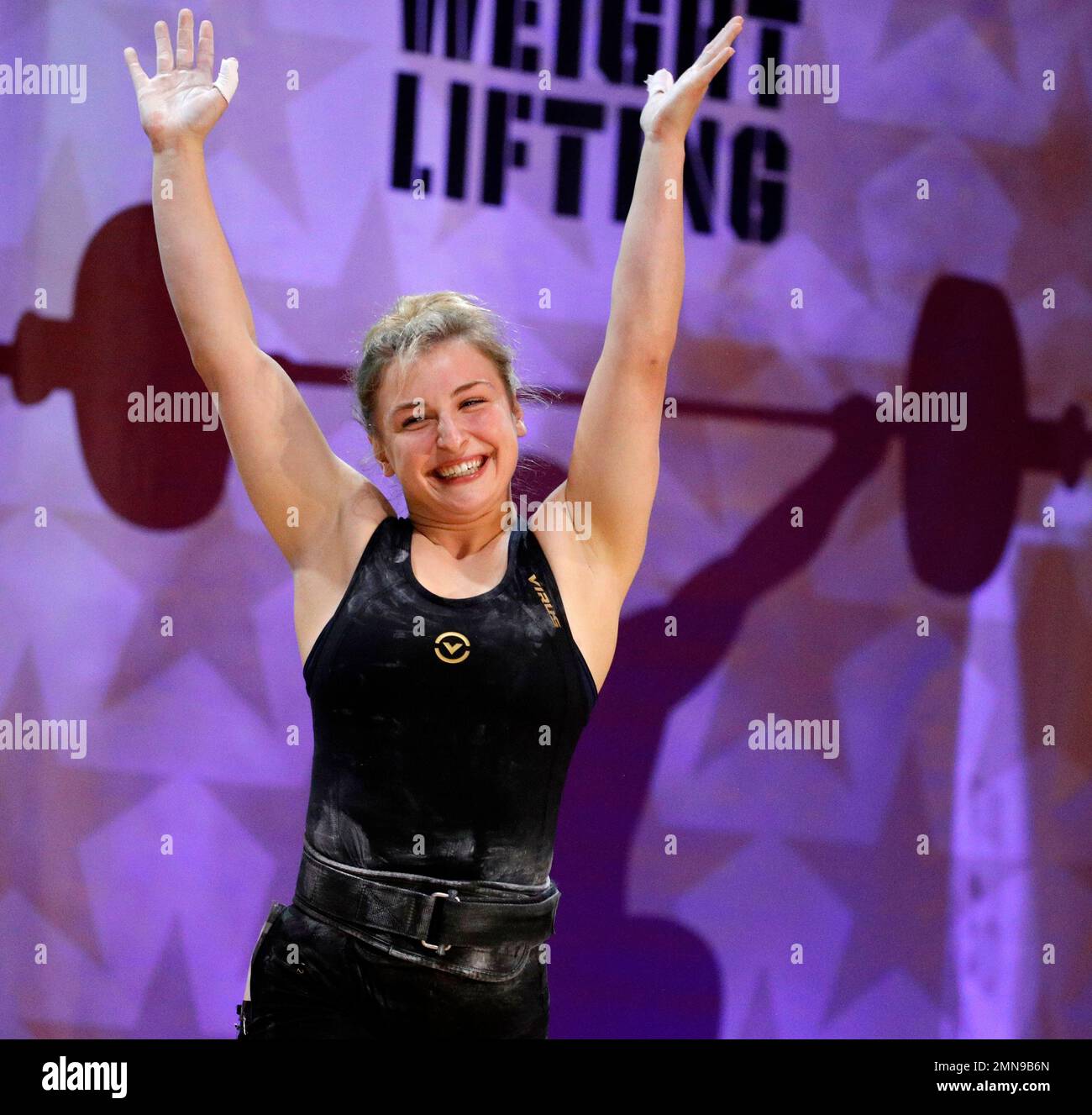 Combined winner Kate Vibert reacts after winning the snatch portion of ...