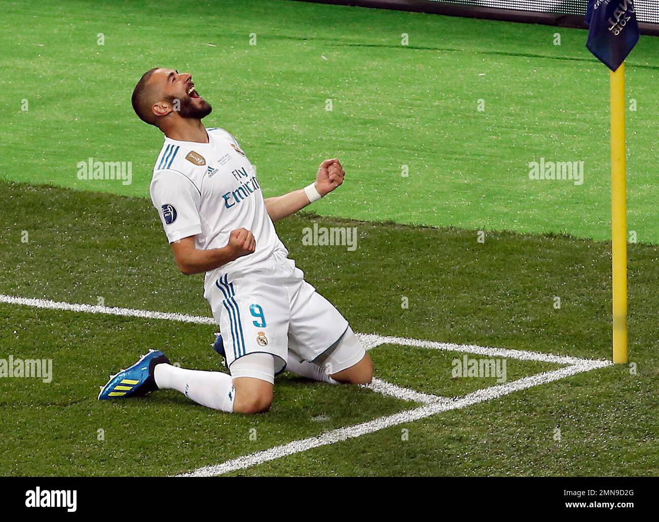 Real Madrid's Karim Benzema celebrates after scoring the opening goal ...