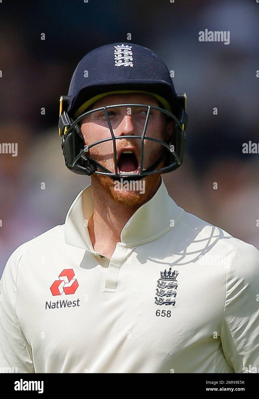 England's Ben Stokes walks from the pitch after being given out caught ...