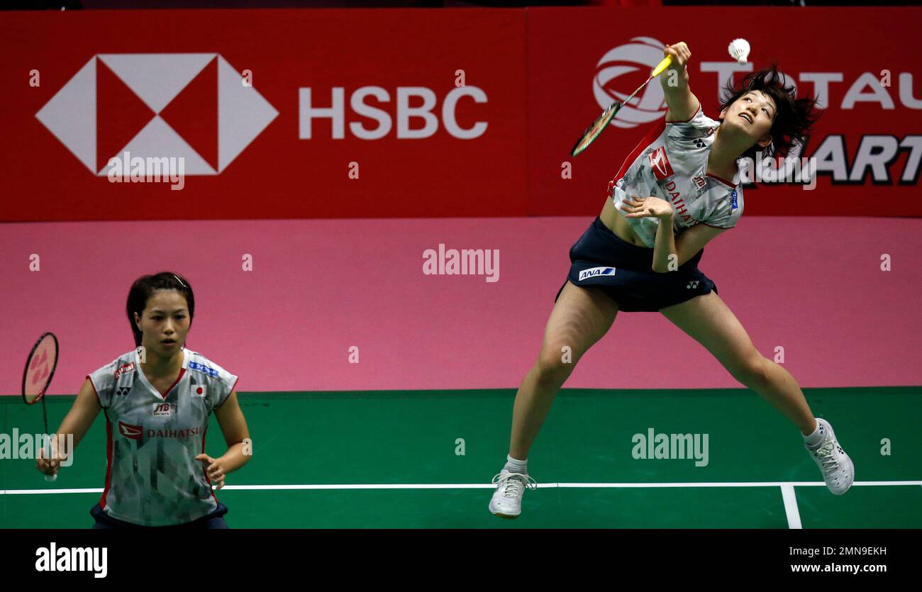 Yuki Fukushima, left , and Sayaka Hirota of Japan return the ...