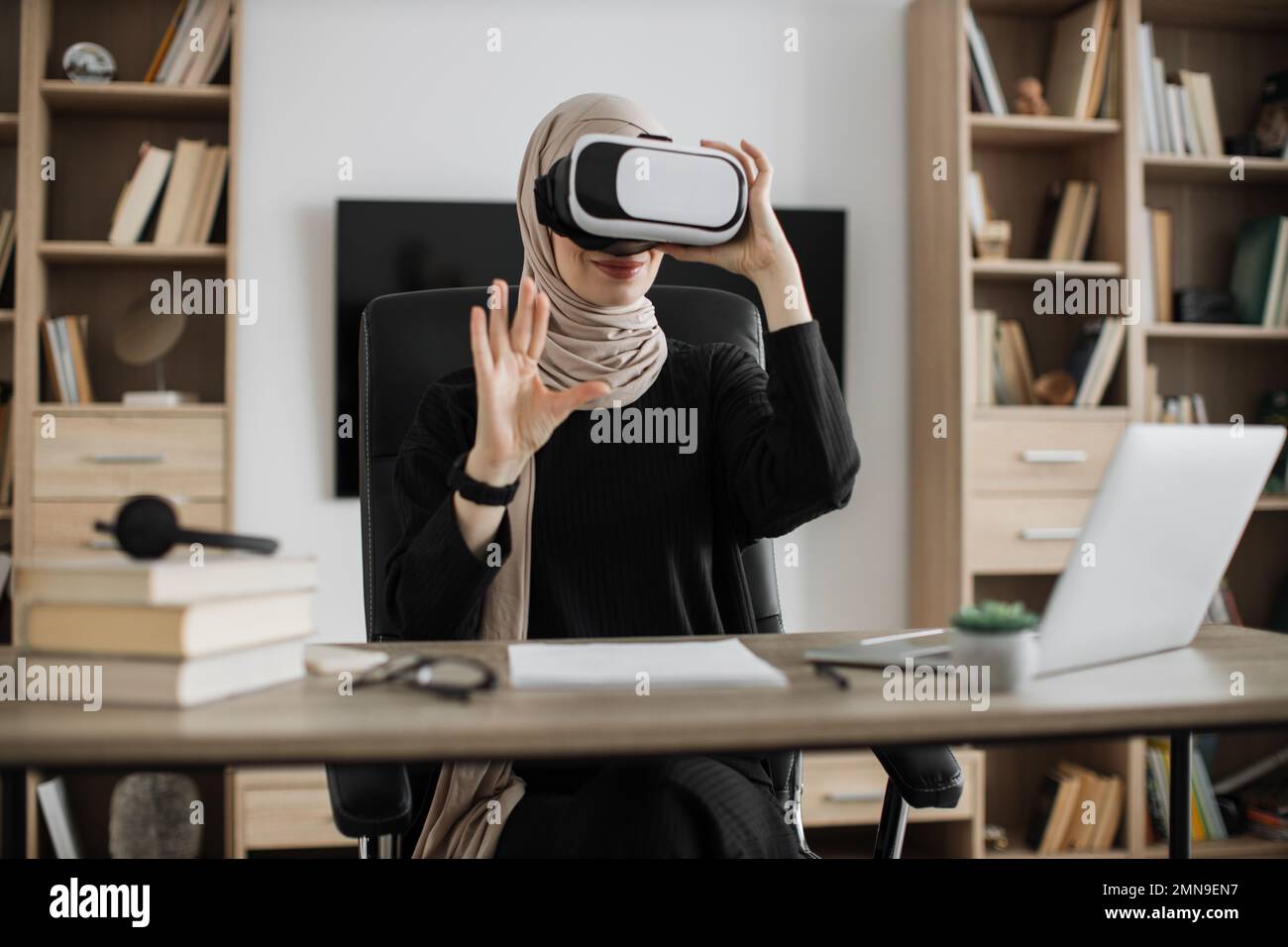 Female arabian woman girl typing hi-res stock photography and images ...