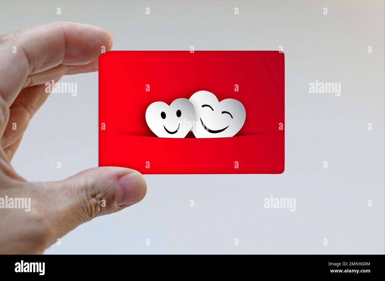 Hand holding card hi-res stock photography and images - Alamy