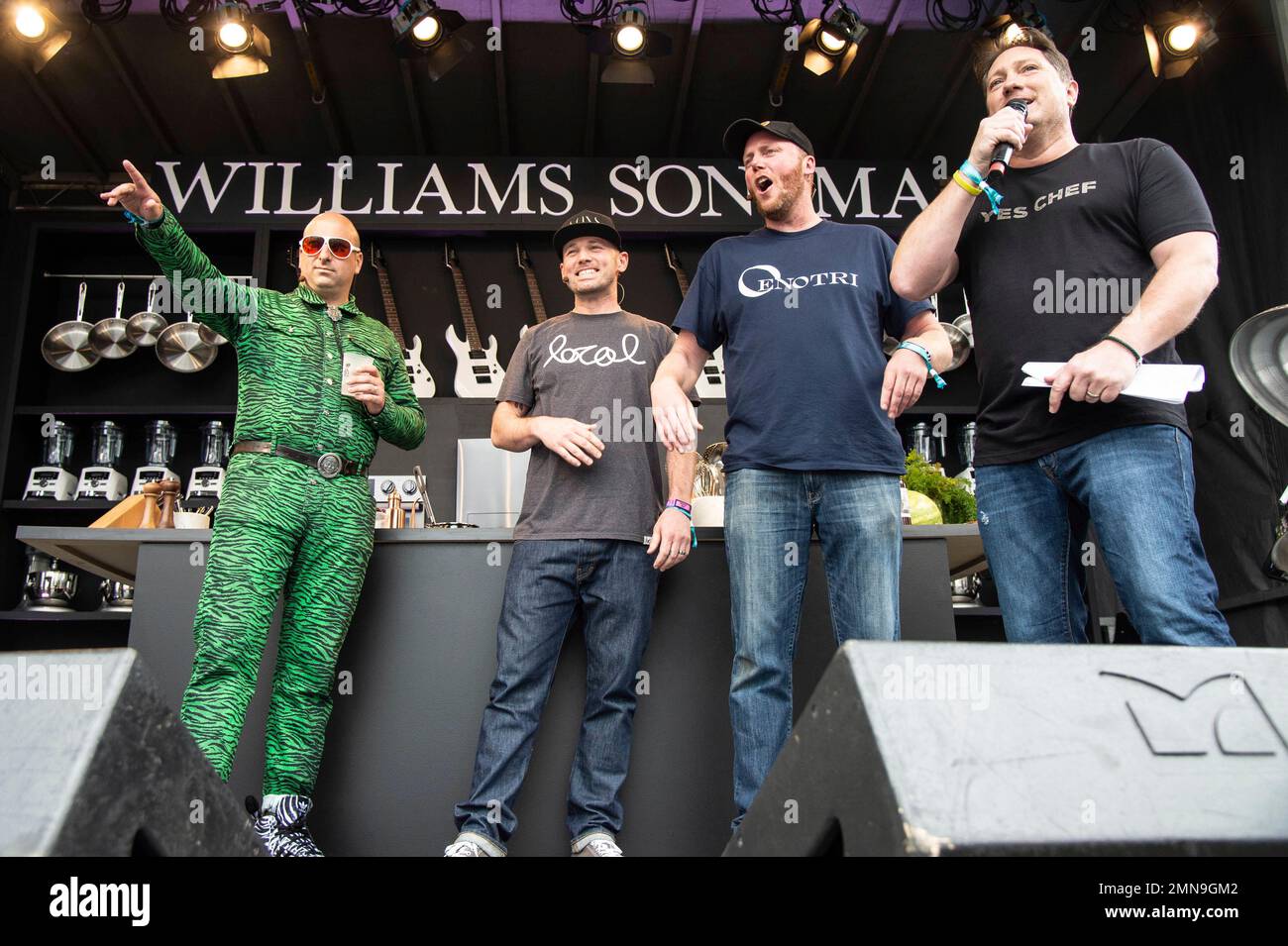 Tony Cervone, from left, Aaron Meneghellil, Tyler Rodde cook on the ...