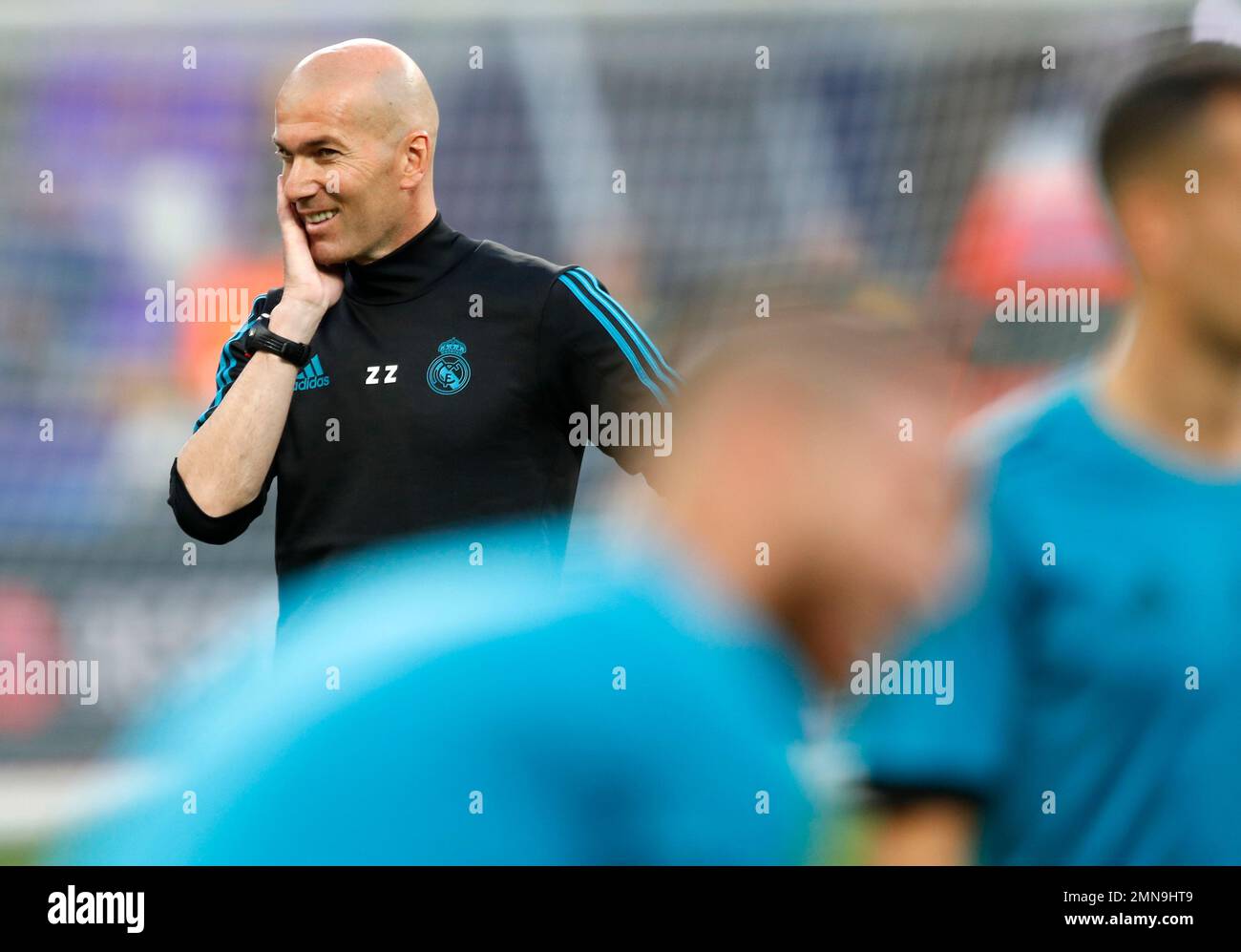 Real Madrid coach Zinedine Zidane smiles during a training session at ...