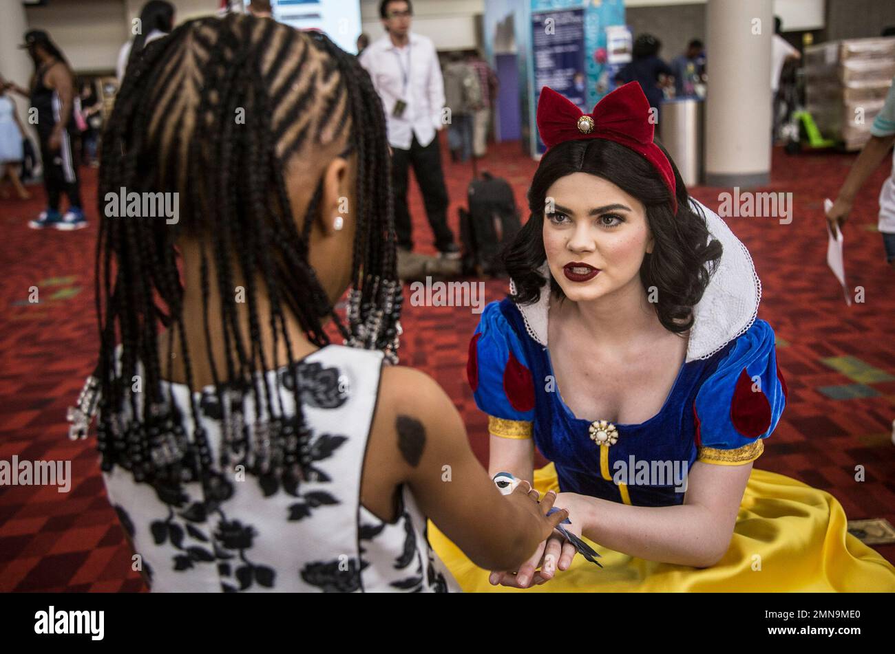 A MomoCon attendee dressed as the Disney version of fairy tale ...