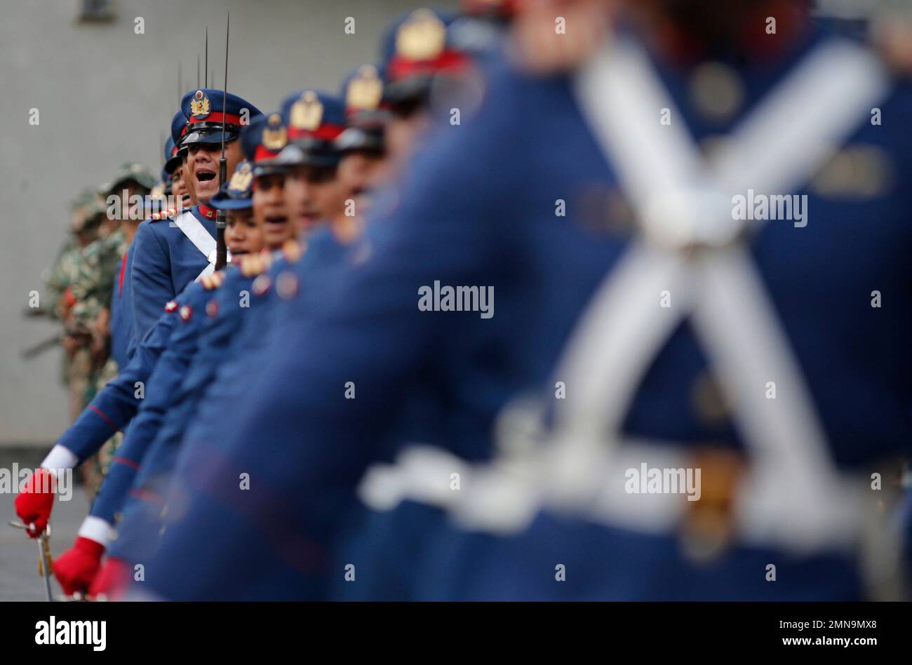 Air Force cadets sing Venezuela's national anthem during a military ...