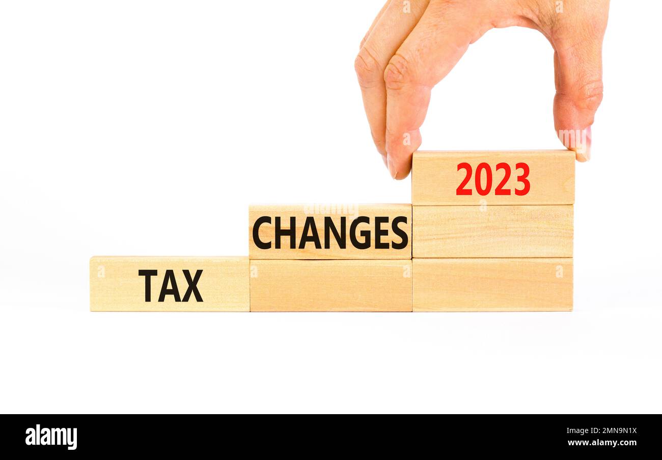 Tax changes 2023 symbol. Concept words Tax changes 2023 on wooden ...