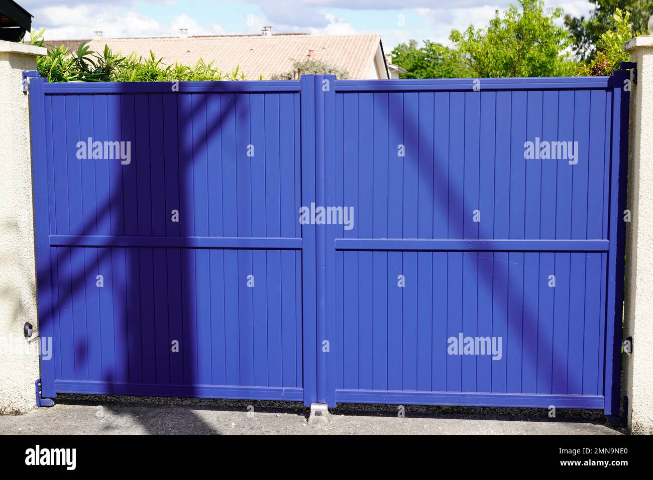 portal blue metal aluminum house gate street view Stock Photo - Alamy