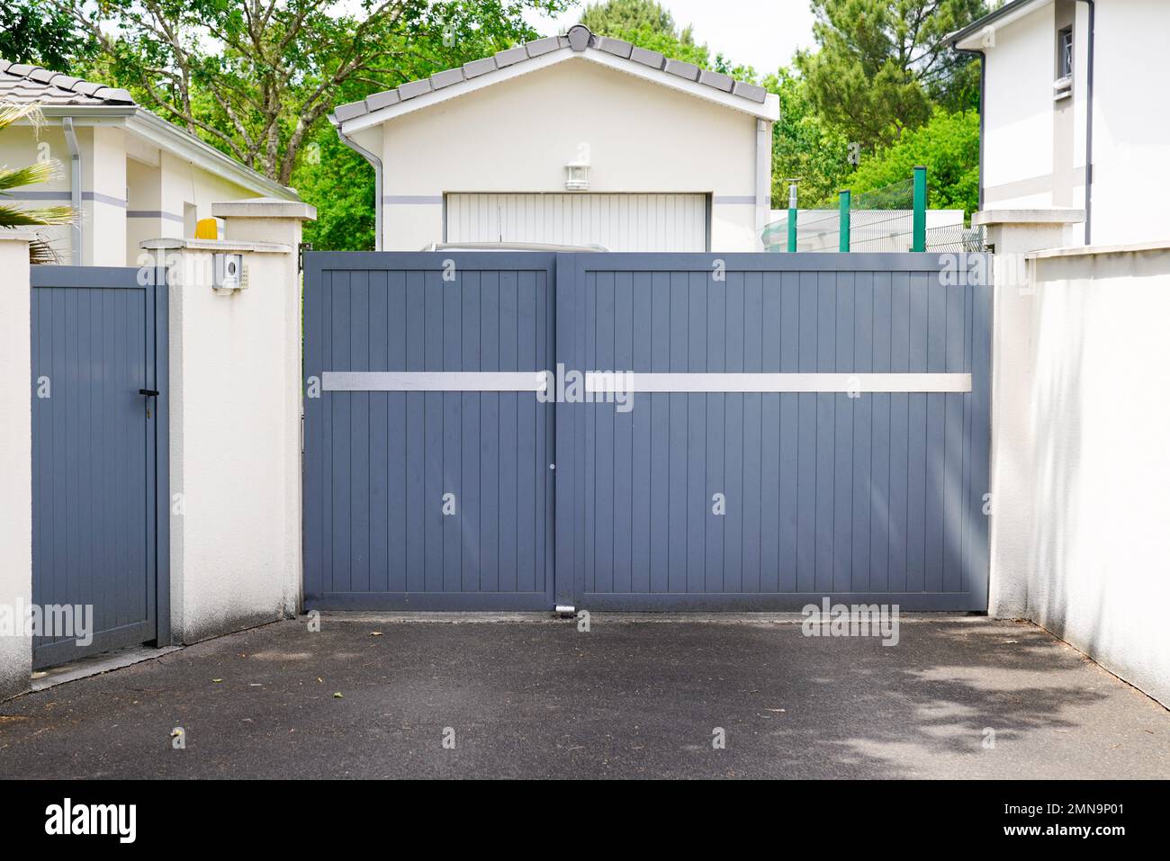 portal street suburb home grey house wicket gate garden access door ...