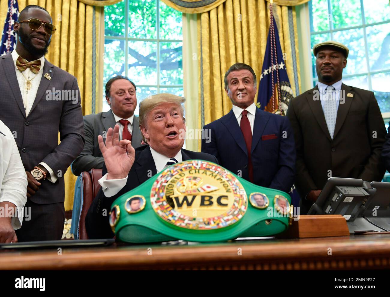 President Donald Trump, center, speaks as he posthumous pardons Jack ...