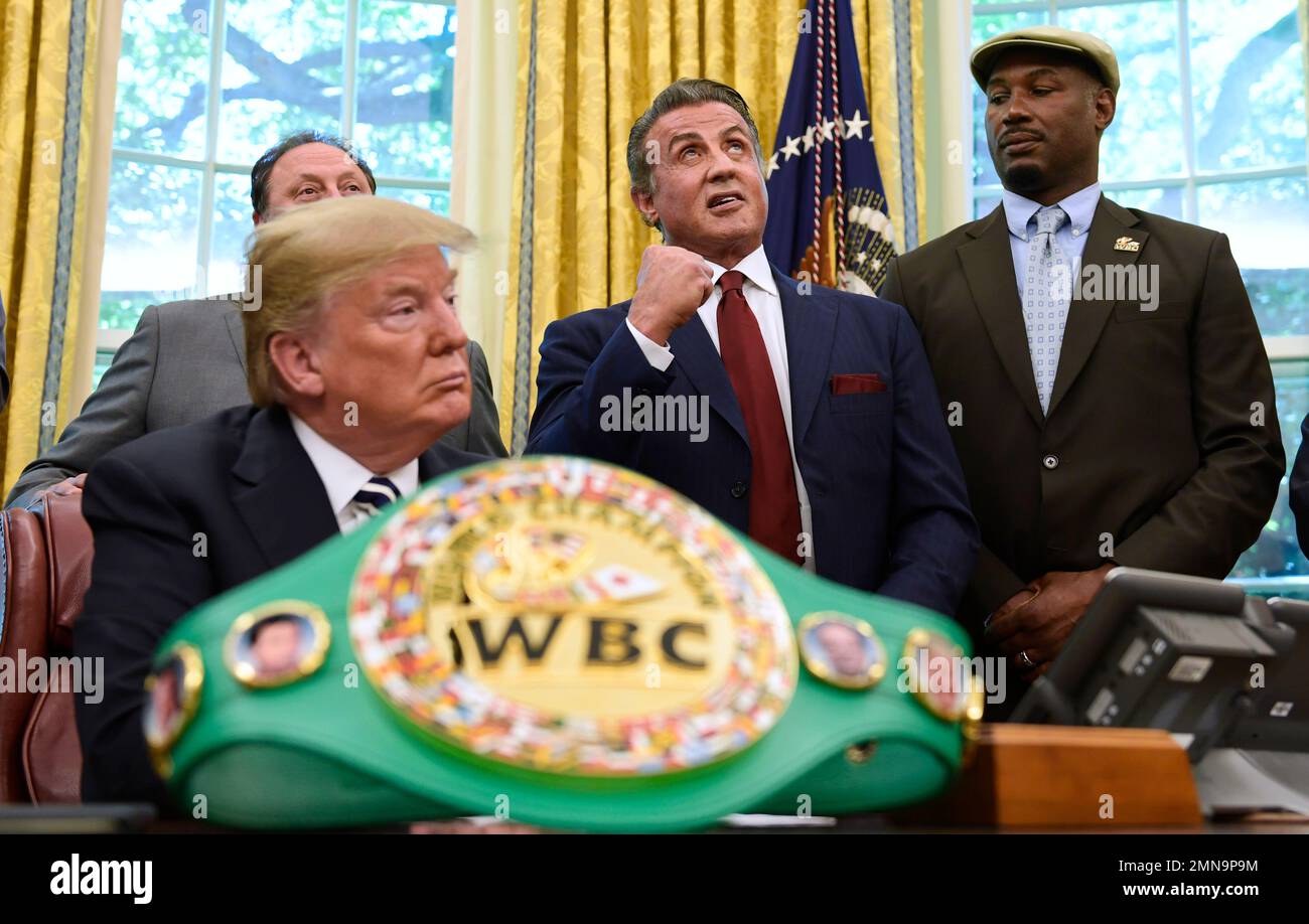 President Donald Trump, left, and heavyweight champion boxer, Lennox ...