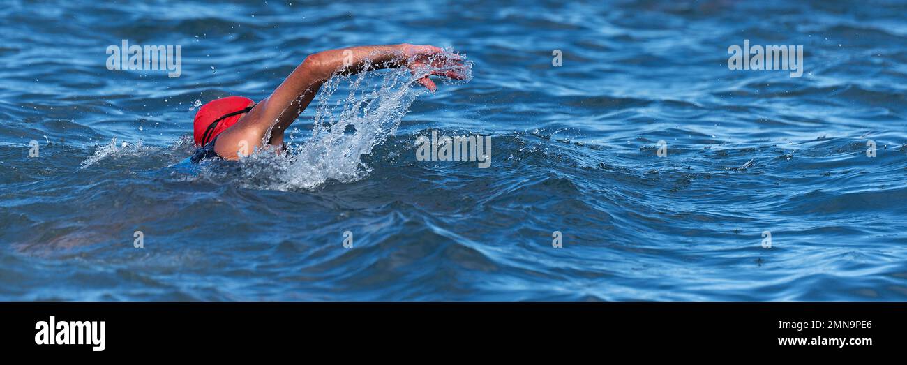 A white arm of a caucasian swimmer athlete swimming in the ocean Stock ...
