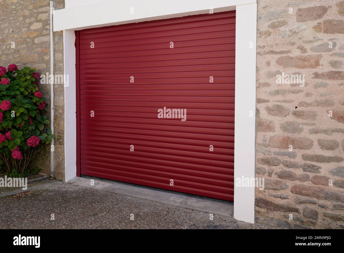 Modern automatic car garage roller door red closed metal gate Stock ...