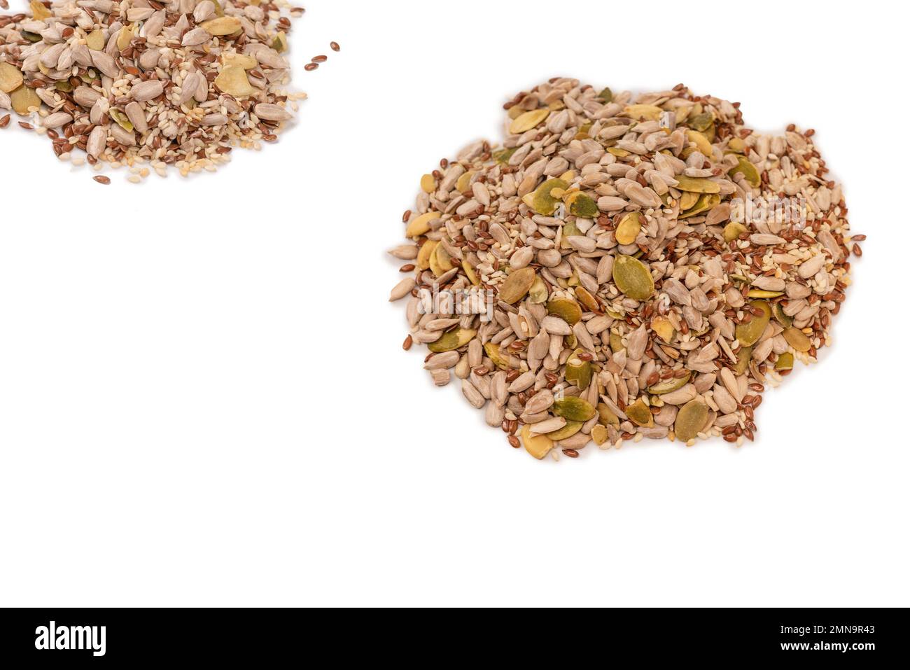 Mixed seeds pile isolated sunflower hi-res stock photography and images ...