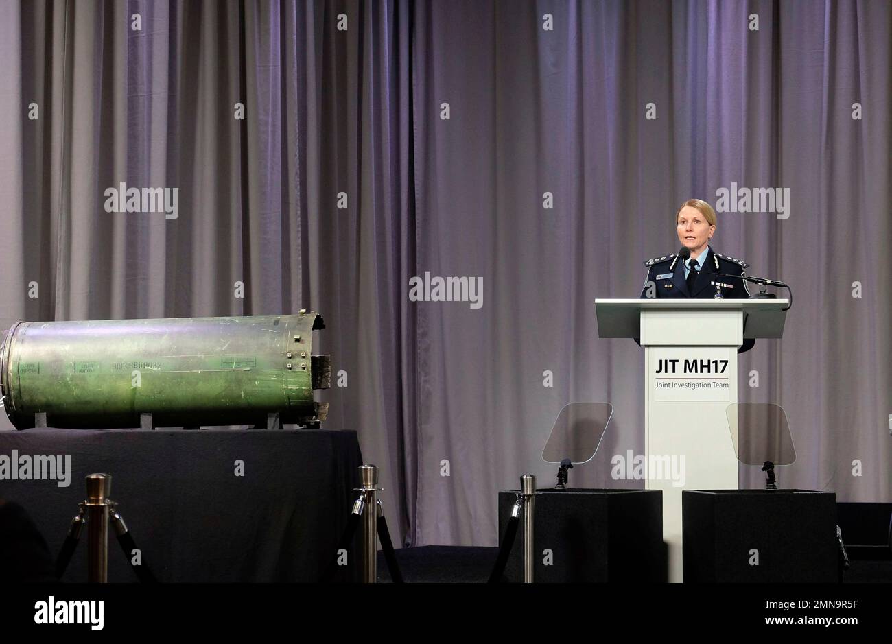 Australian Federal Police Commander Jennifer Hurst speaks as she stands ...
