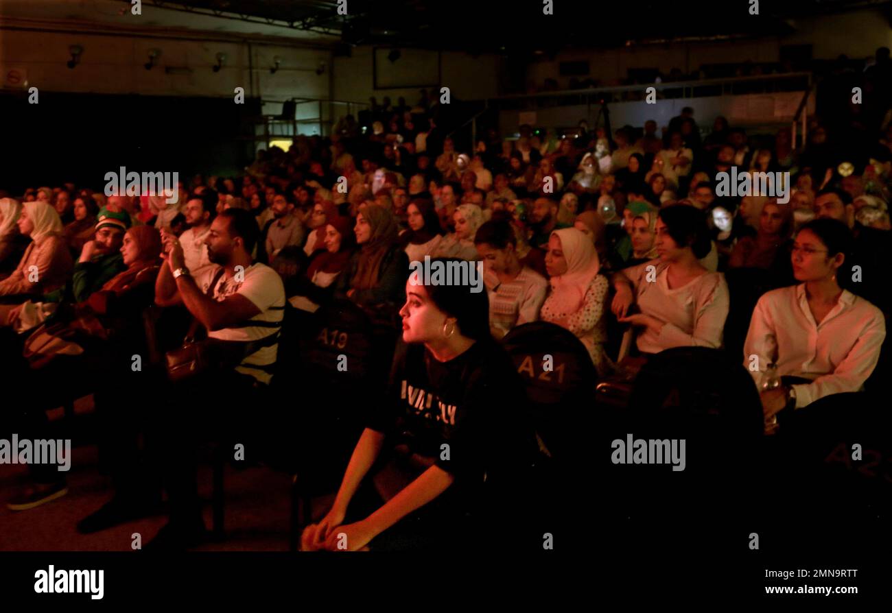 In this May 3, 2018 photo, people watch a marionette performance with ...