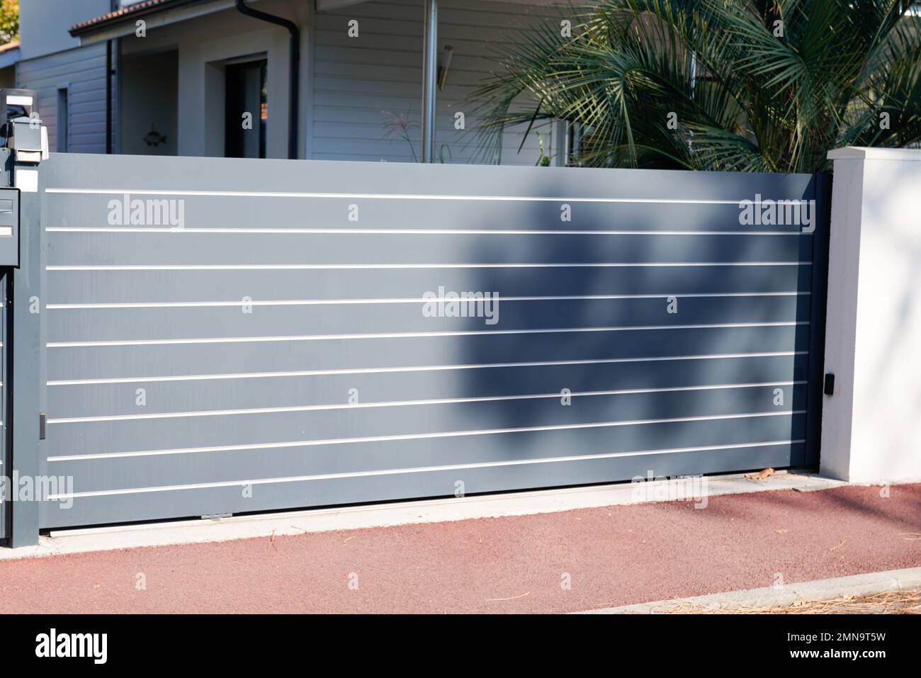 slide door high grey sliding metal gate house portal of suburb home ...