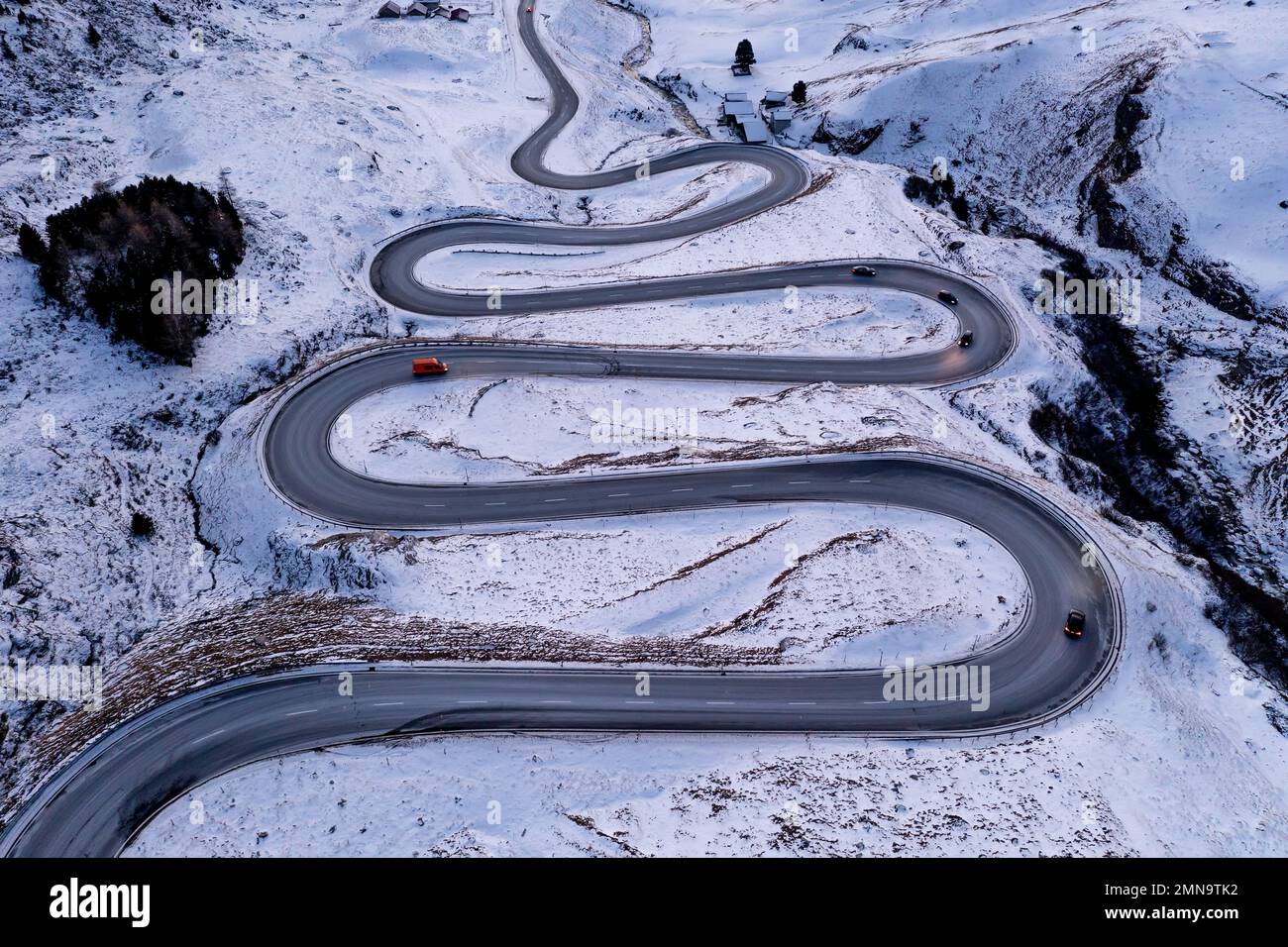 A snake shaped pass road in winter photographed from above Stock Photo ...