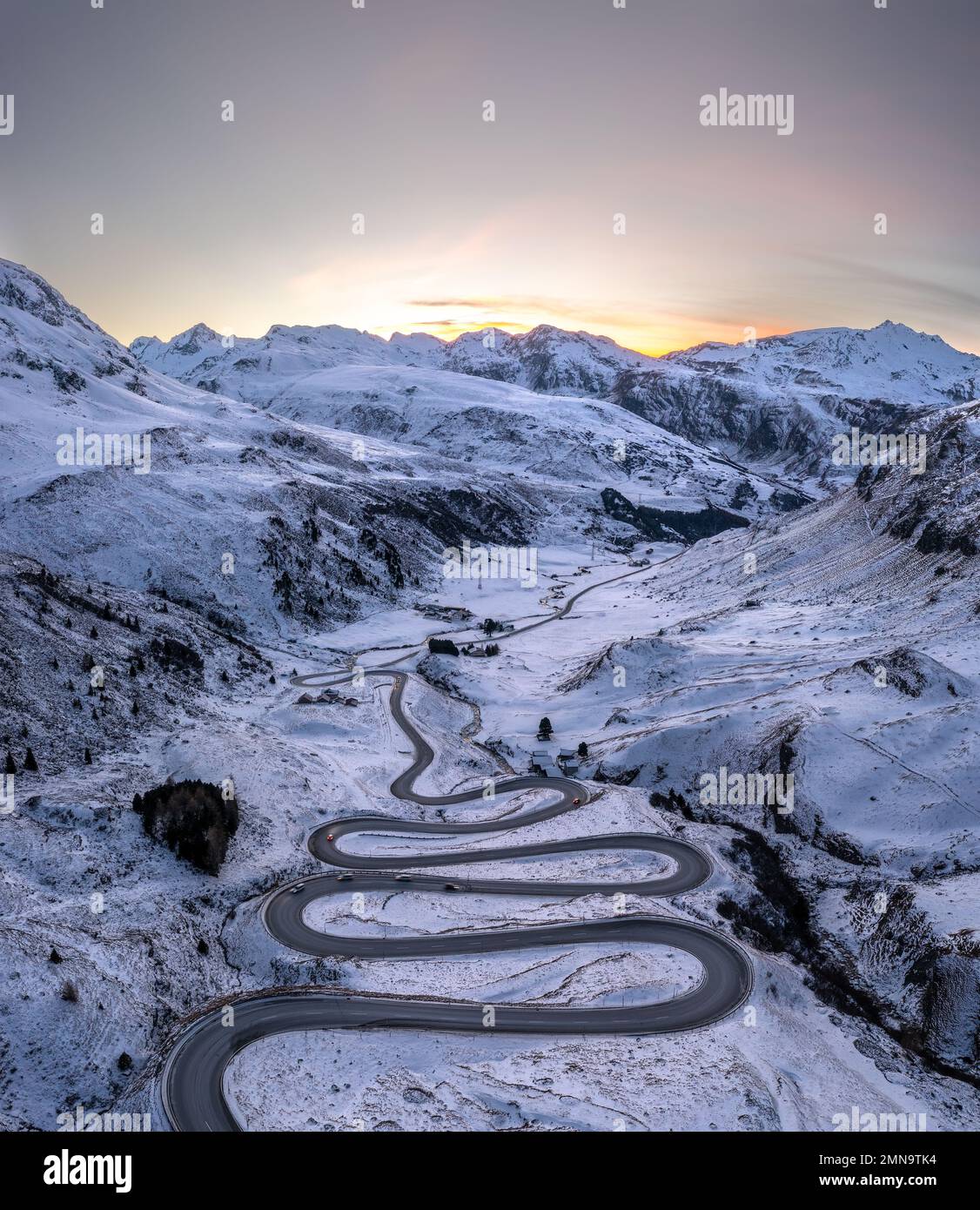 A snake shaped pass road in winter photographed from above Stock Photo ...