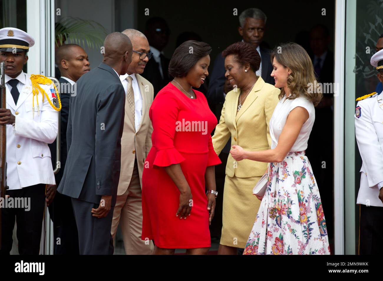 Spain's Queen Letizia Ortiz, right, talks to Haiti's first lady Martine ...