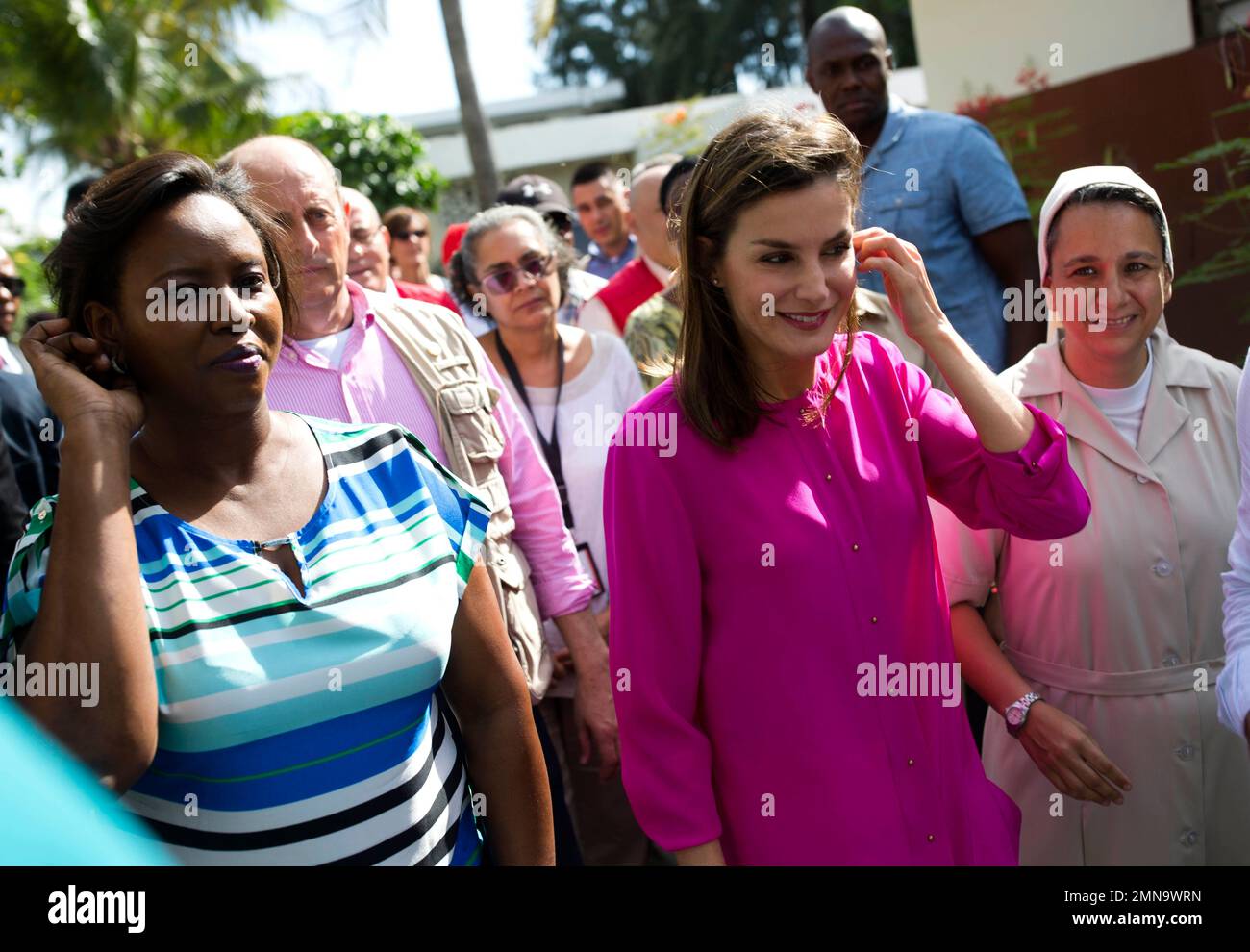 Haiti's first lady Martine Moise, left, walks next to Spain's Queen ...