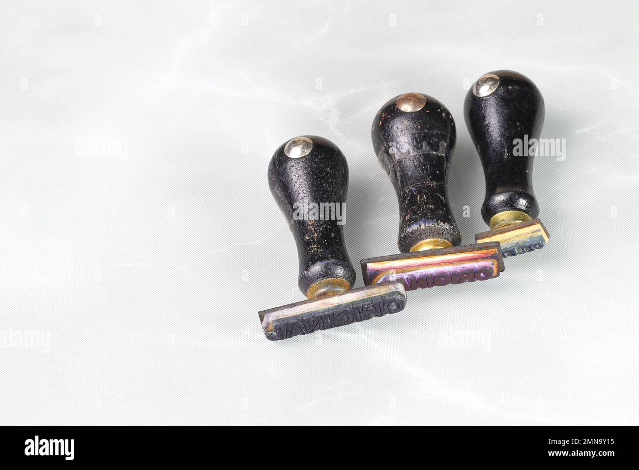 used Wooden rubber stamps isolated on reflection surface Stock Photo ...