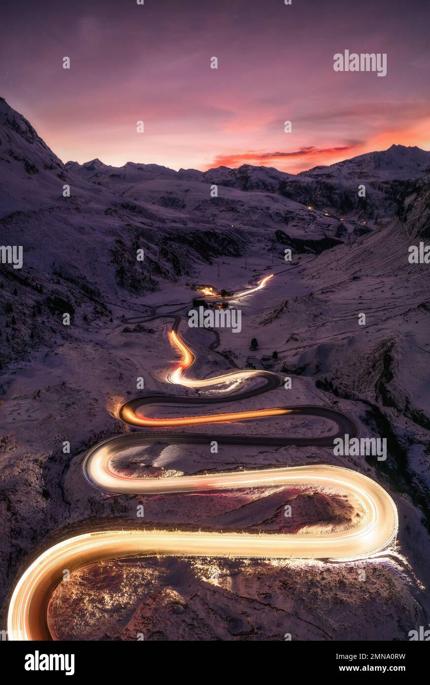 A snake shaped pass road photographed at night.light painting Stock ...