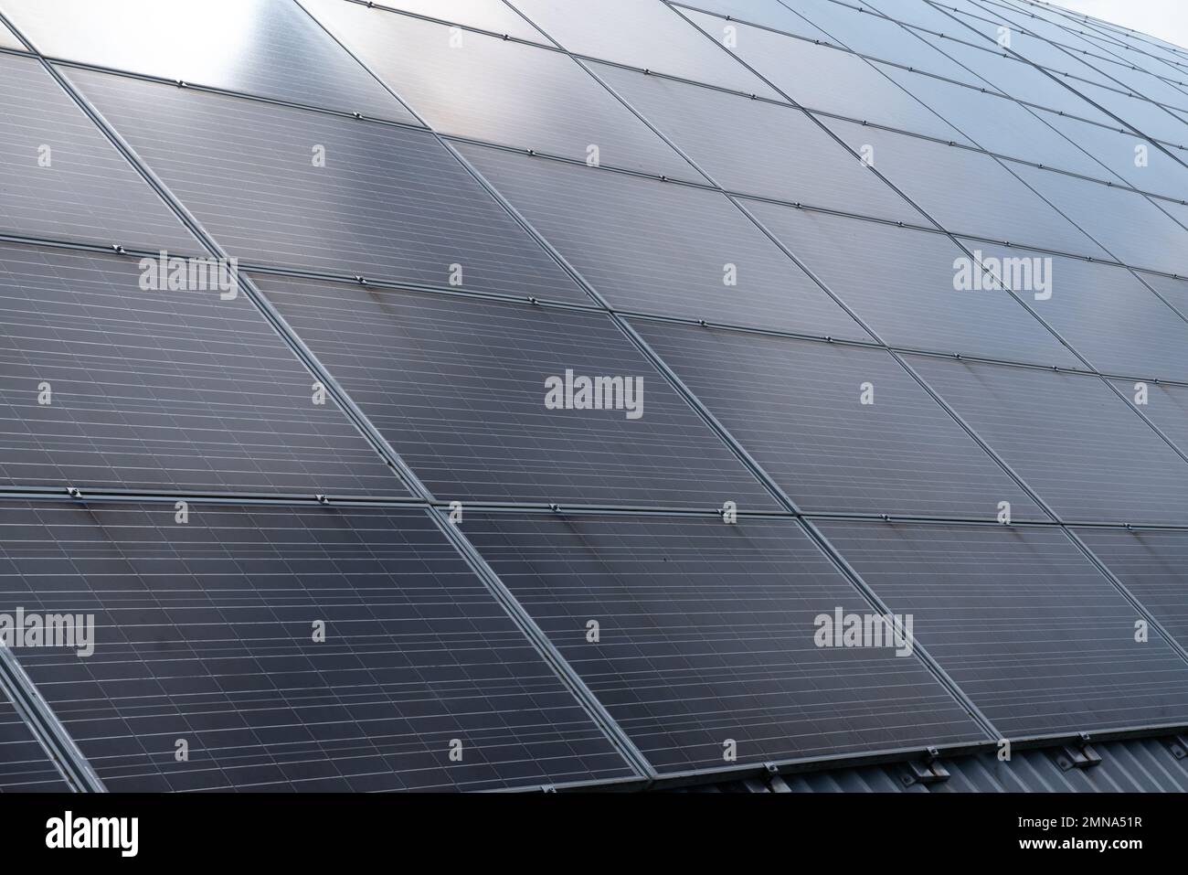 Solar panels panorama sun flare reflection Stock Photo - Alamy