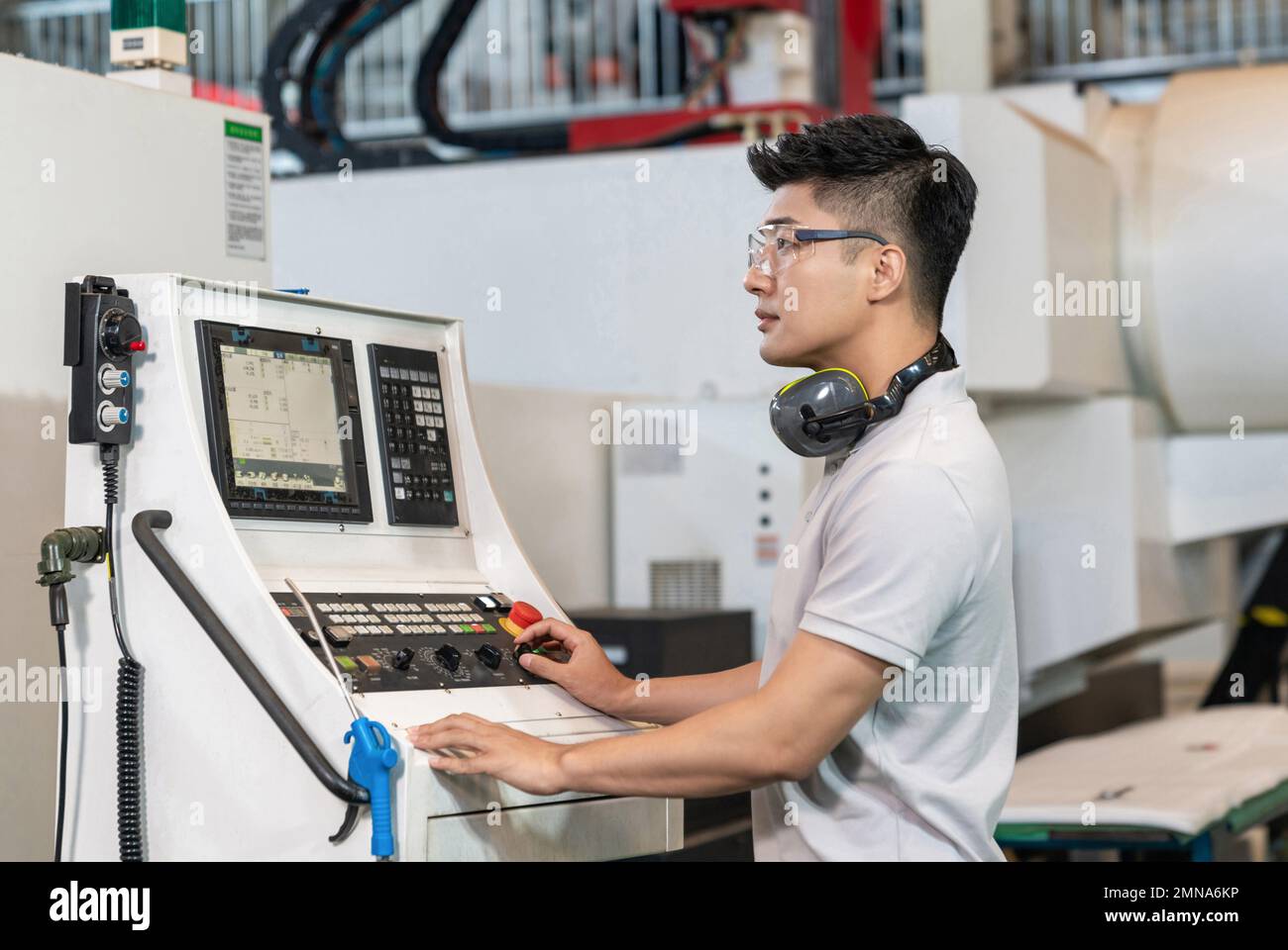 Engineers working in the factory Stock Photo - Alamy