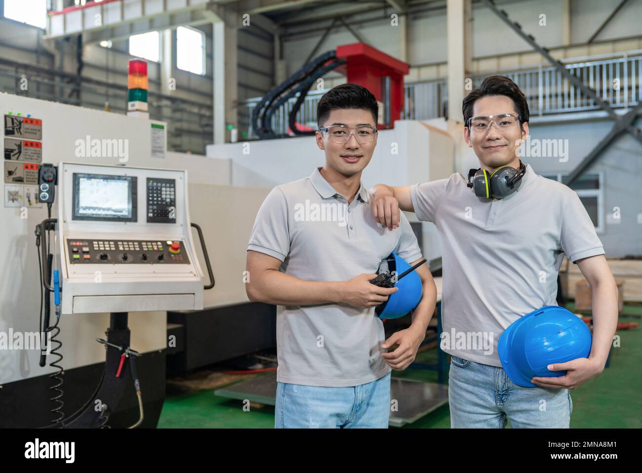 Engineers working in the factory Stock Photo - Alamy