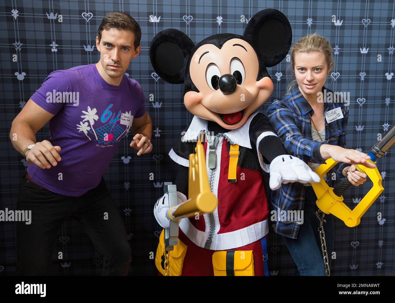 Celebrity attendees pose with King Mickey at the exclusive KINGDOM ...