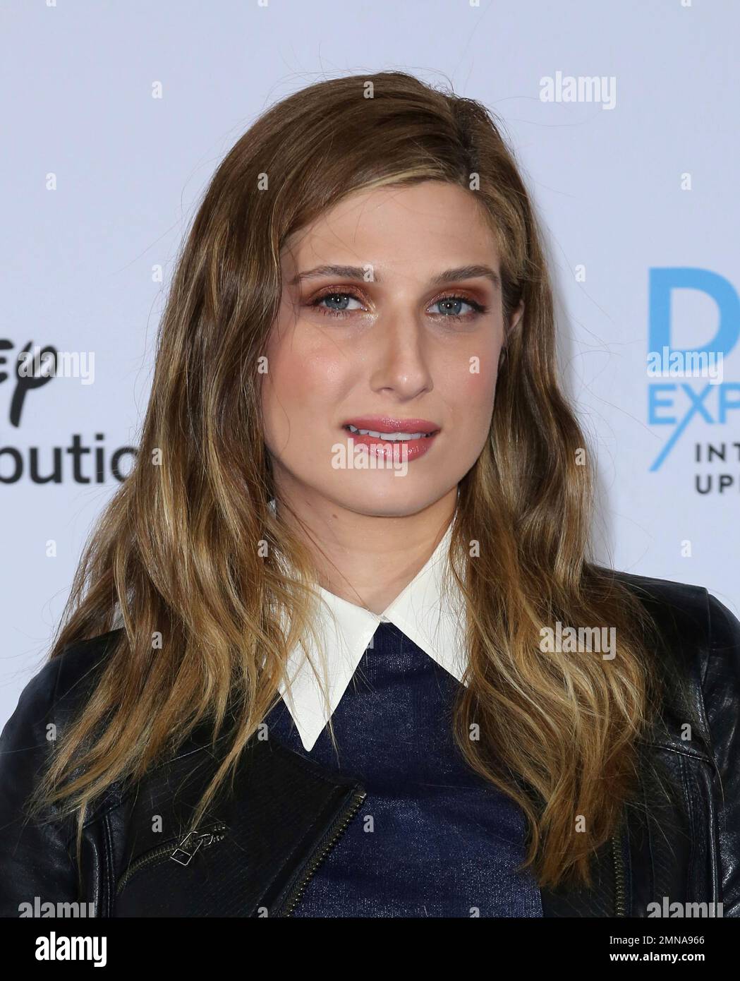 Emily Arlook arrives at the Disney's International Upfront Red Carpet ...