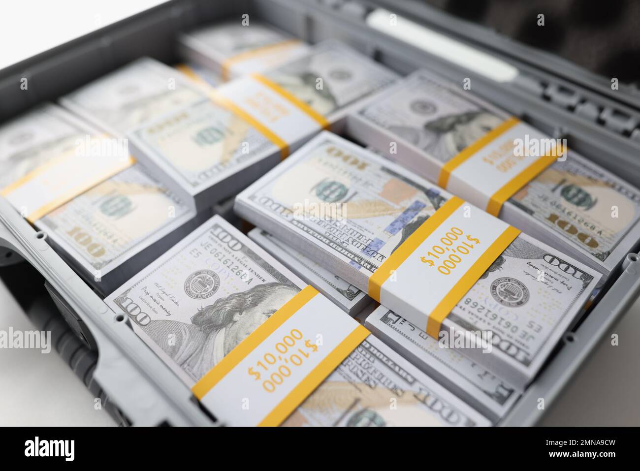 Briefcase full 100 dollar bills hi-res stock photography and images - Alamy