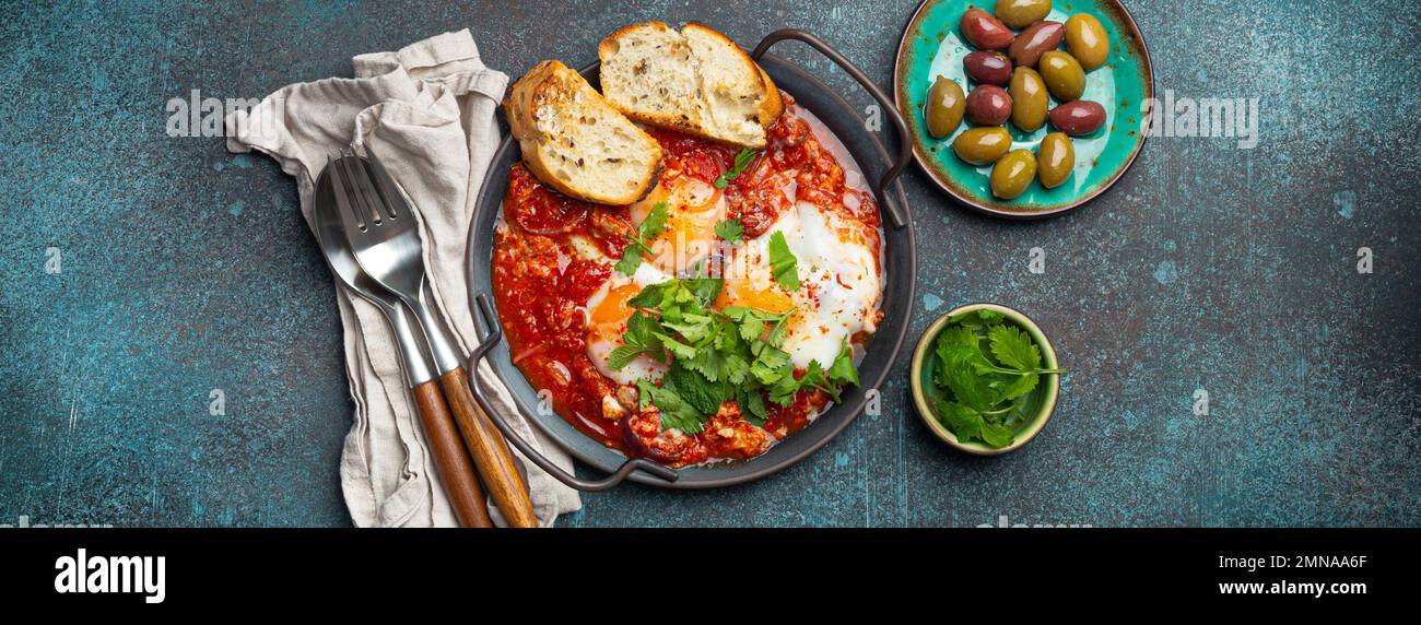 Middle Eastern and Maghrebi healthy dish Shakshouka made of eggs and ...