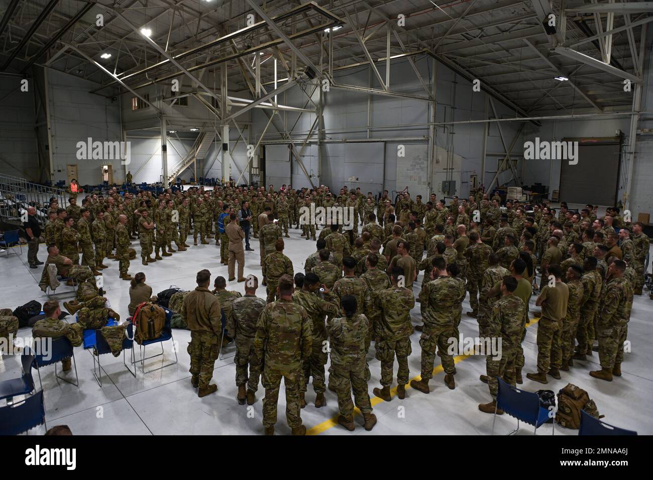 U.S. Air Force Airmen take roll-call as they prepare for their ...