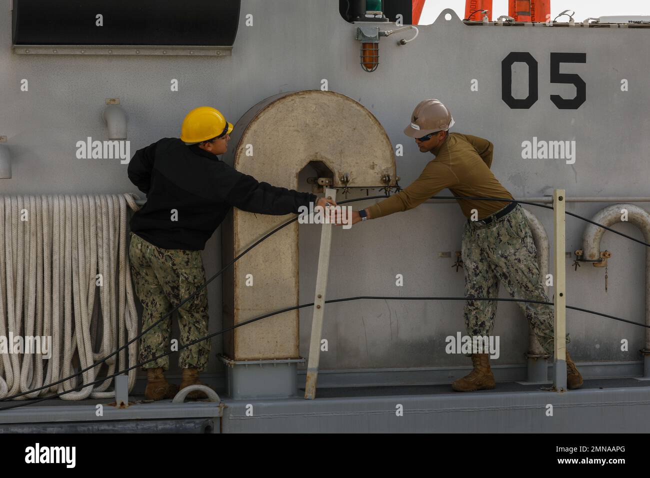 U.S. Navy Boatswain’s Mate 2nd Class Davansh Mehta, right, and ...