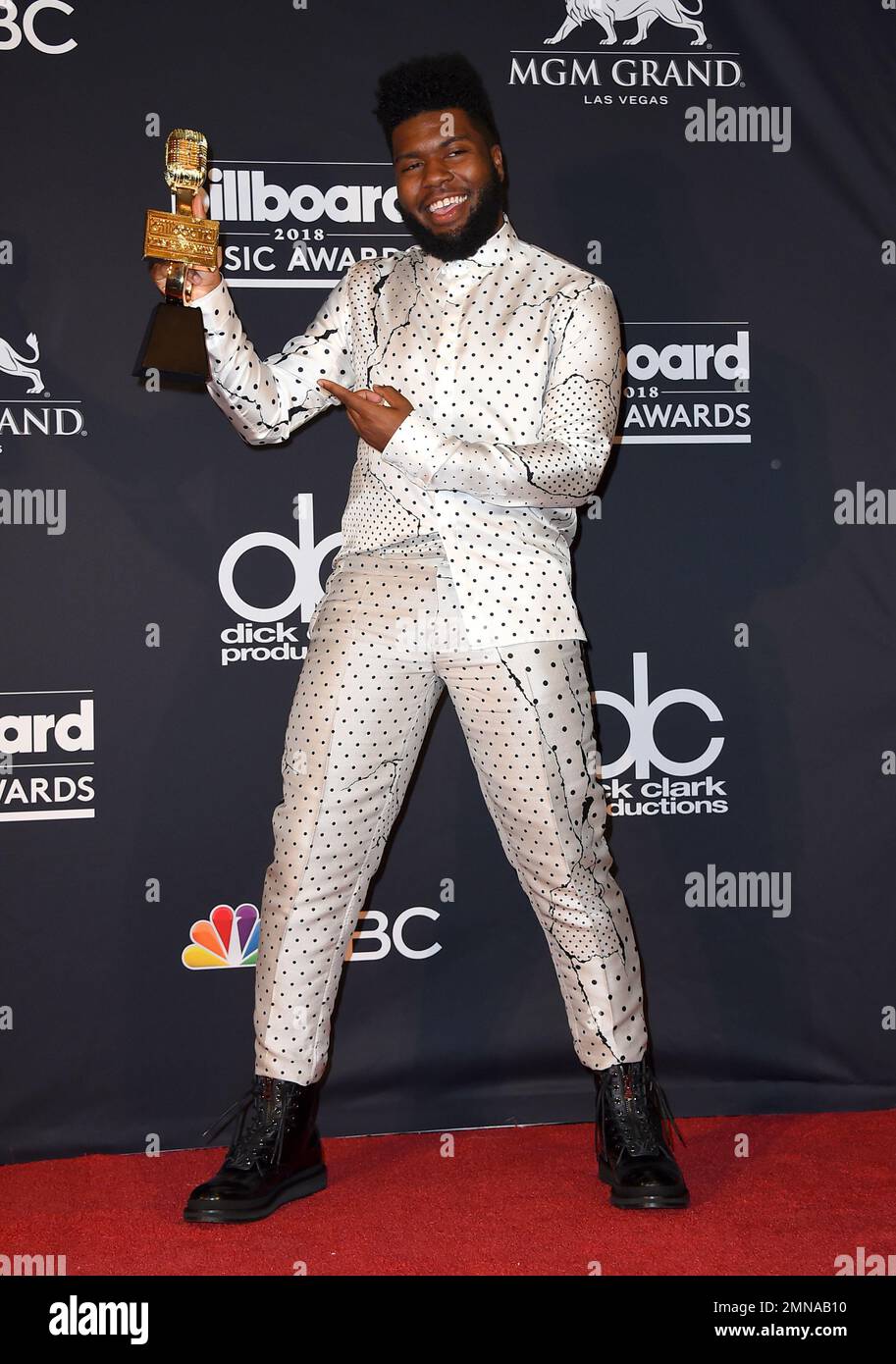 Khalid poses in the press room with the award for top new artist at the ...