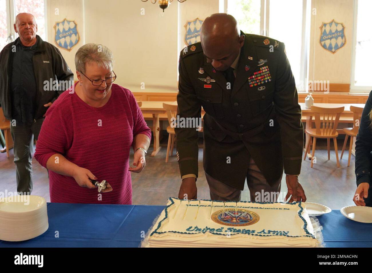 Sieglinde Schmalzl, 40-year awardee, and Garrison Commander Col. Kevin ...