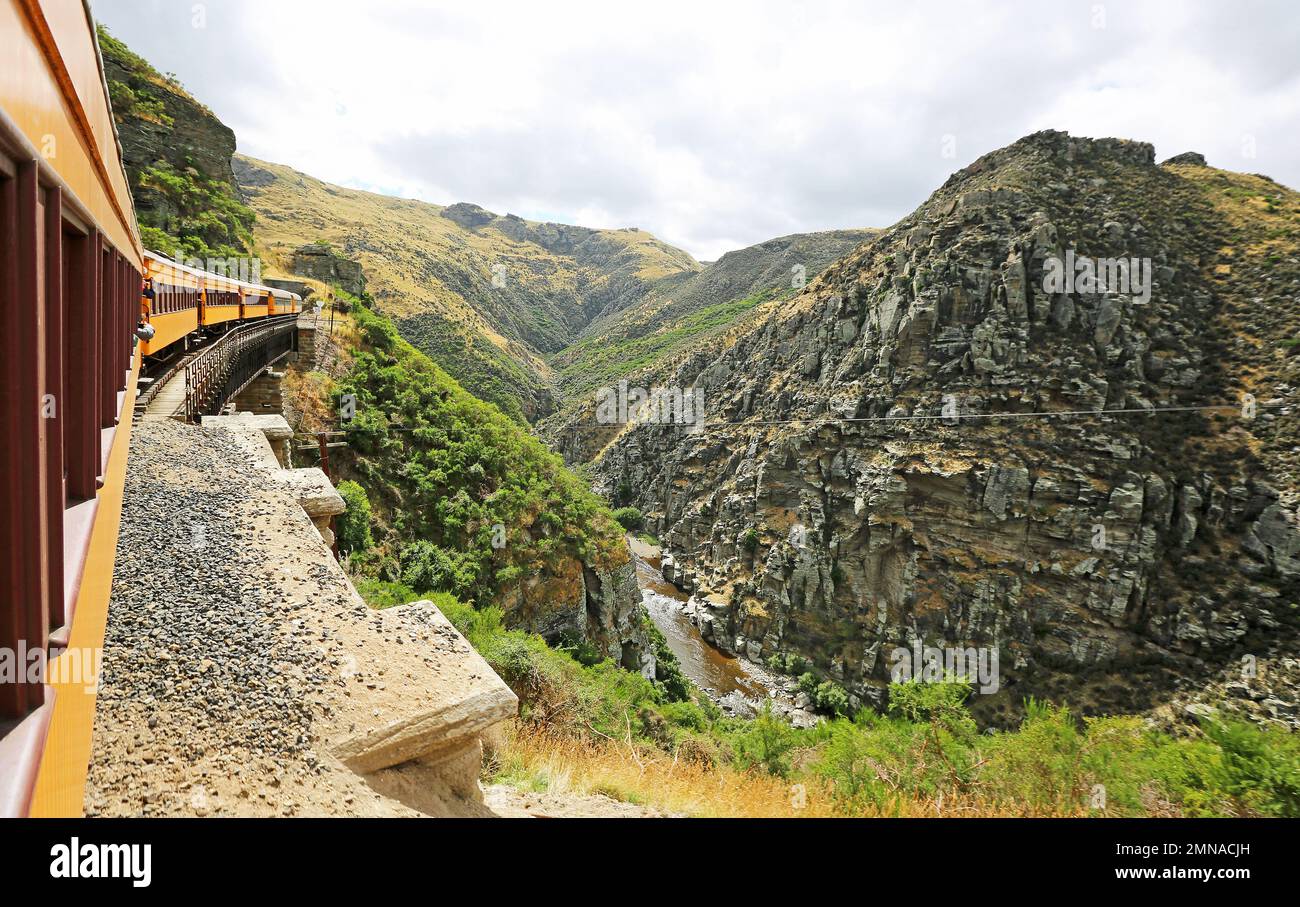 A train on a cliff - Taieri River Gorge - New Zealand Stock Photo - Alamy