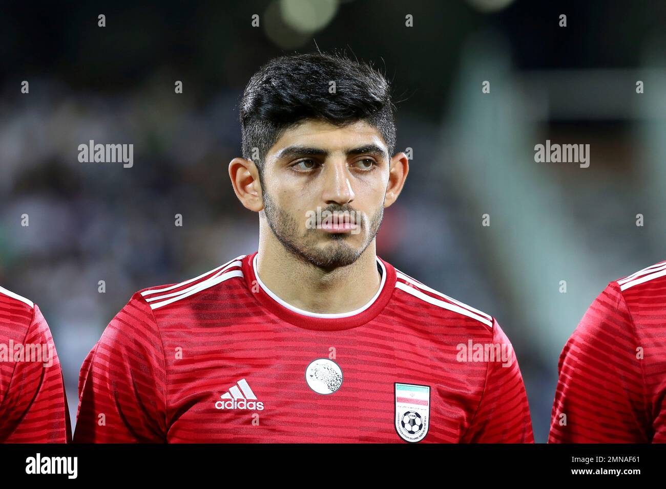 Iran's Mehdi Torabi listens to the national anthem before the ...