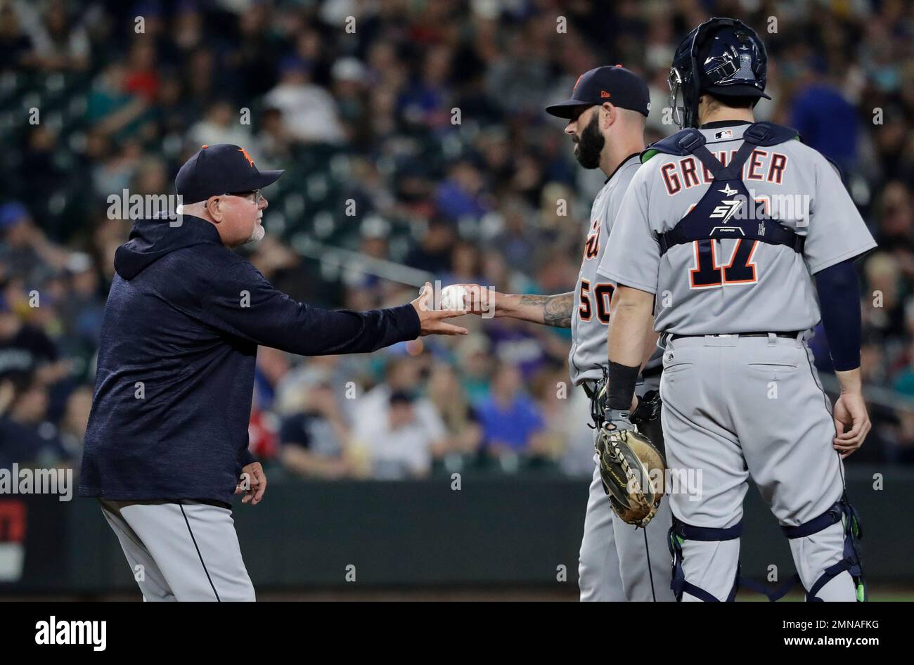 Detroit Tigers starting pitcher Mike Fiers, second from right, is ...